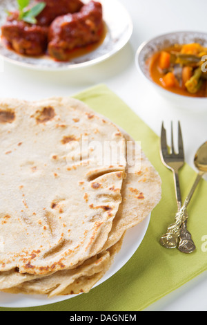 Chapati or chapatti, Indian dhal and chicken curry, popular Indian food ...