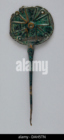 A disc-headed pin made of bronze, this artifact represents ancient ...