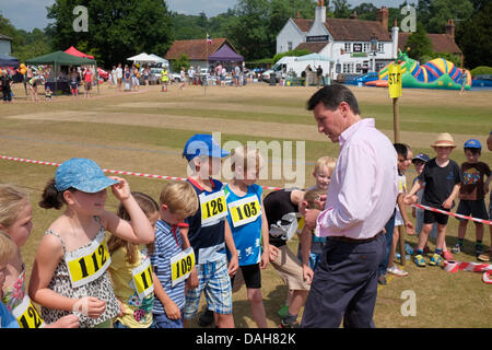 TILFORD VILLAGE SUMMER FETE with children country dancing on a village ...