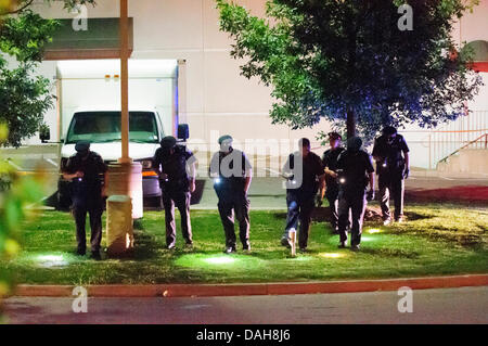 Vaughan, Canada. 12th July, 2013. York Regional Police officers comb ...