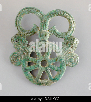 This harness ring, made of bronze, is an example of ancient ...