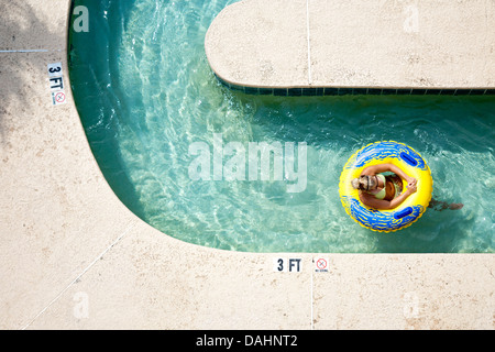 Lady in an inner tube Stock Photo - Alamy