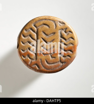 This hemispheroid stamp seal is an ancient artifact used for sealing ...