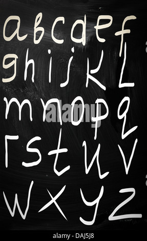 alphabet handwritten with chalk on a blackboard Stock Photo - Alamy