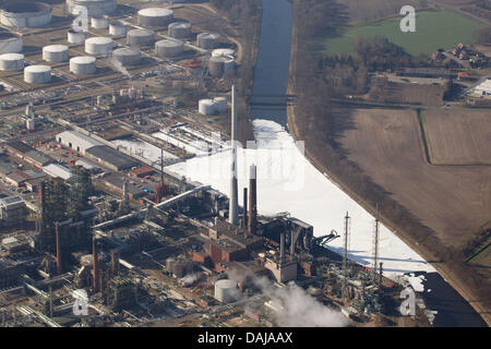 Aerial view on extinguishing foam covering the harbour basin of a BP ...