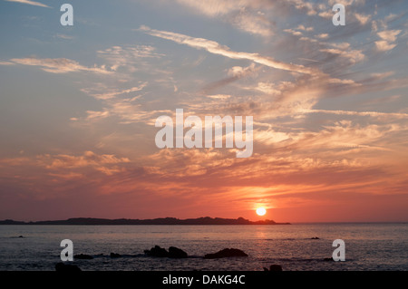 Sunset over Burhou island, Alderney, Channel Islands Stock Photo - Alamy