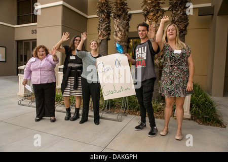A handicapped Adult Transition Program (ATP) student is welcomed by ...