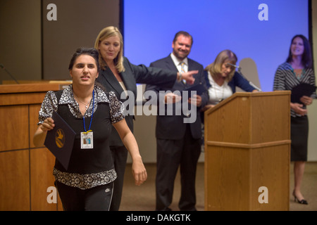 An Adult Transition Program (ATP) student receives her diploma at Stock ...