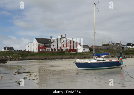 sailing boat and Scarinish hotel Isle of Tiree Scotland July 2013 Stock ...