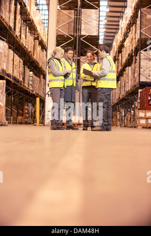 Young hispanic woman speaking on the phone about bills depressed and ...