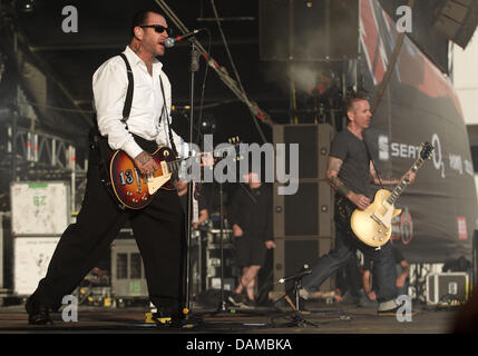 US punk band Social Distortion with lead singer Mike Ness (L) and ...