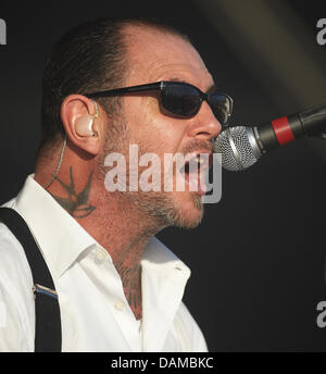 US punk band Social Distortion with lead singer Mike Ness (L) and ...