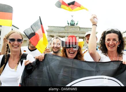 Female women's soccer fans dressed in German fan gear are on their way ...