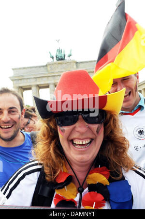 Female women's soccer fans dressed in German fan gear are on their ...