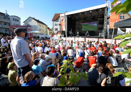 Fans attend the World Cup Group G soccer match between Belgium and Iran ...