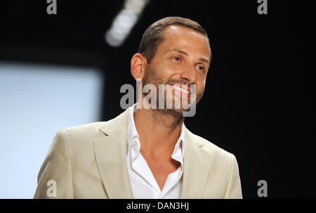 The designer Dimitri after his show during the Mercedes-Benz Fashion ...