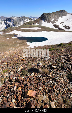 High alpine lake in North Cascades National Park with female hiker ...