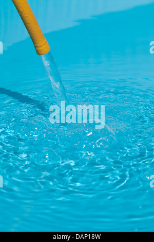 filling up pool Stock Photo - Alamy