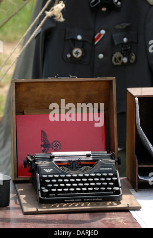 Wartime German field typewriter on desk with map and a document bearing ...