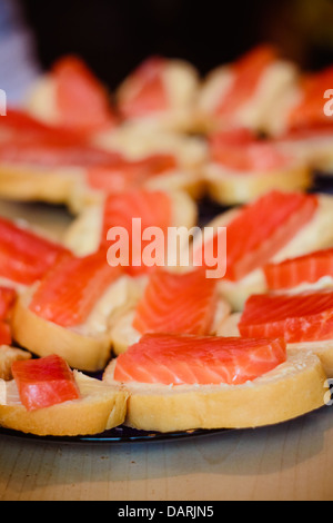 Salmon sandwiches on white plate Stock Photo - Alamy