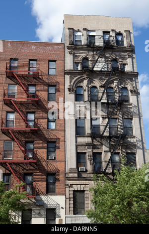 A classic New York City fire escape on the front of an tenement ...