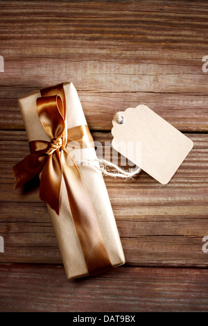 Rectangular gift box with a bow on a red background, close-up Stock ...
