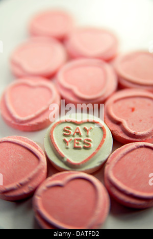 Say yes love hearts sweets Stock Photo - Alamy