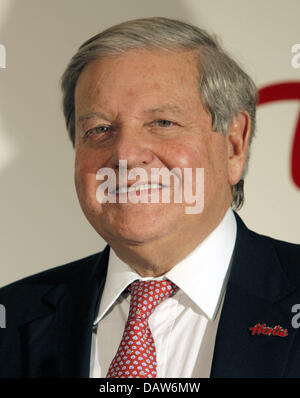 British Investor Guy Naggar poses in front of the new Hertie logo in ...