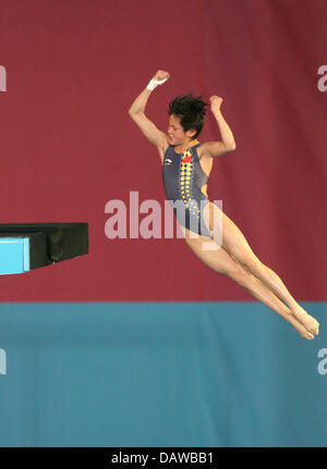 Chinese diver Xin Wang shown in the air during her dive in the final ...