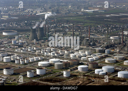 Huge oil tanks are pictured on the premises of the Shell refinery in ...