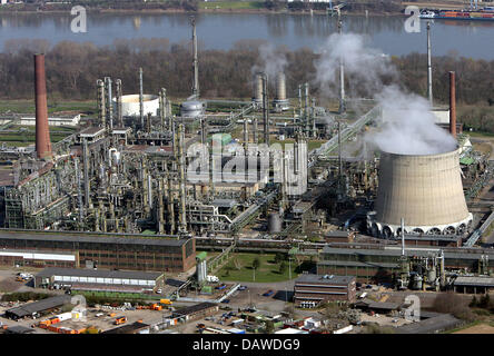 Huge oil tanks are pictured on the premises of the Shell refinery in ...
