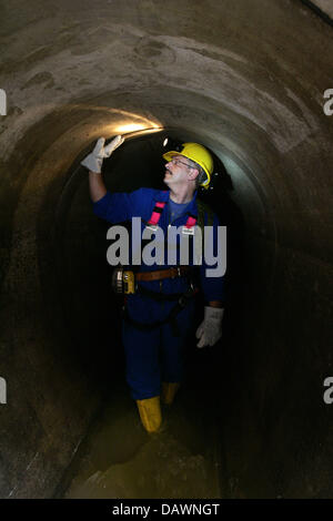 Channel foreman of the city's drainage services, Udo Schellenberger ...