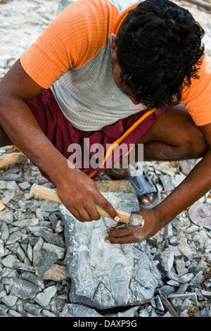 Craftsman carving a statue, Mahabalipuram, Kanchipuram District, Tamil ...