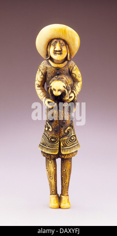 A bronze sculpture of a Dutchman holding a dog, capturing everyday life ...