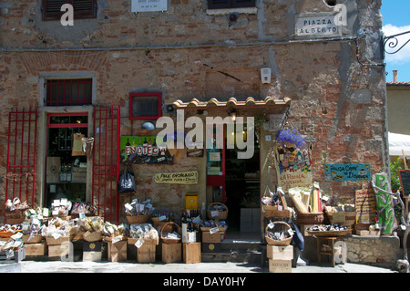 Italian Delicatessen Tuscany, deli produce shopkeeper setting out ...