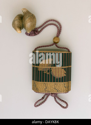 This object is an Inro with ojime and netsuke from Japan, displayed in ...