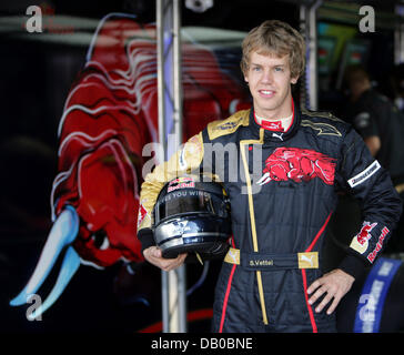 German Formula One rookie Sebastian Vettel of Scuderia Toro Rosso poses ...