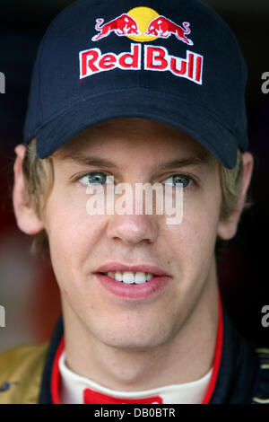 German Formula One rookie Sebastian Vettel of Scuderia Toro Rosso poses ...