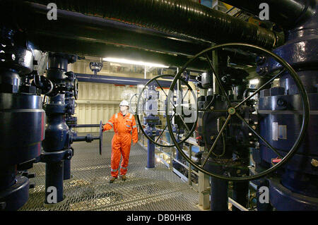 An employee of energy company Wintershall works on offshore platform L8 ...