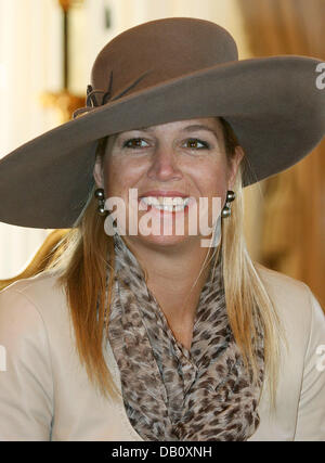 Crown Princess Maxima of the Netherlands sits on a golden chair in Brdo ...