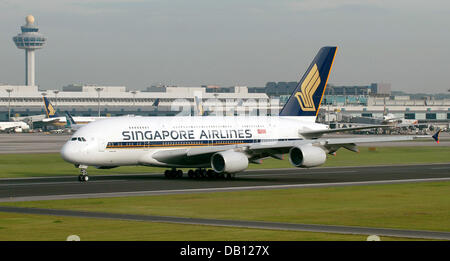 The Airbus A380 taxis at the Singapore Changi Airport after its landing ...