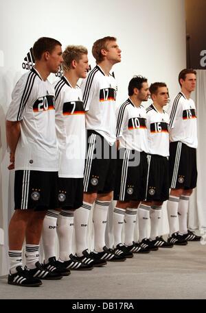 German internationals Per Mertesacker (C) and Tim Borowski celebrate ...
