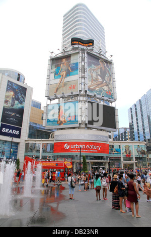 Downtown Toronto at Dundas Square on Yonge Street showing entertainment ...