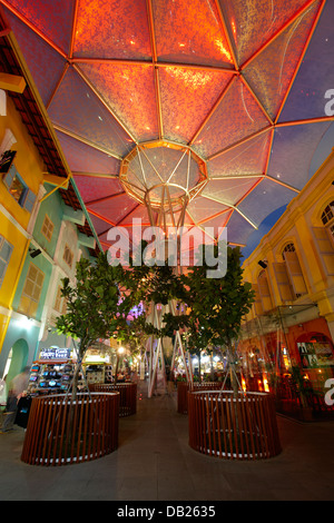 A narrow street with canopy of the outdoor cooling system at Clarke ...