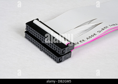 Ribbon connector (IDE/ATA interface cable) against a white background ...