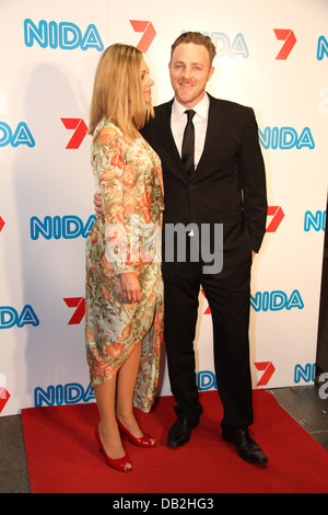 Claire Aird and Nathaniel Dean arrive on the red carpet for the annual ...