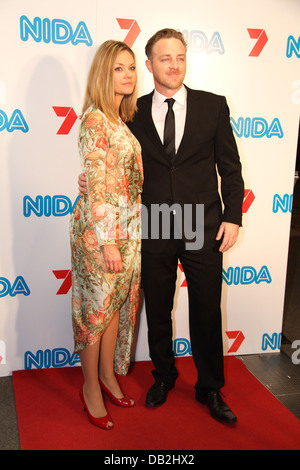 Claire Aird and Nathaniel Dean arrive on the red carpet for the annual ...