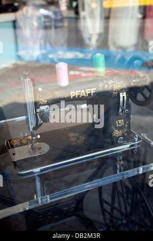 Old Sewing machine Window Display, Gloucester Quays Stock Photo - Alamy