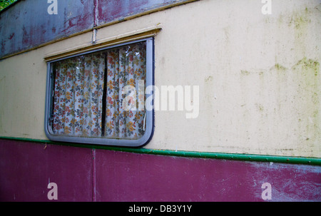 A shabby / decaying 1950s caravan photographed at a 1950s museum in Cae ...