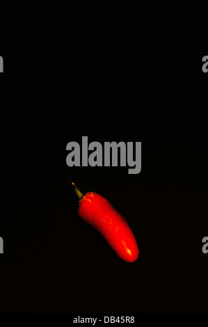 Red chilis and chili powder Stock Photo - Alamy